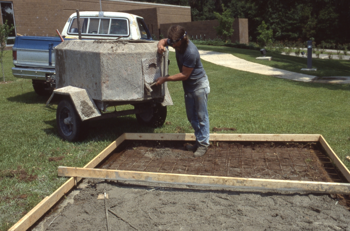 Florida Memory • Charles Hook pouring concrete for the base of his ...