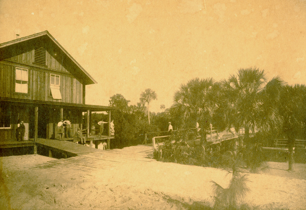 Florida Memory • Koreshan Unity store next to bridge over the Estero River.