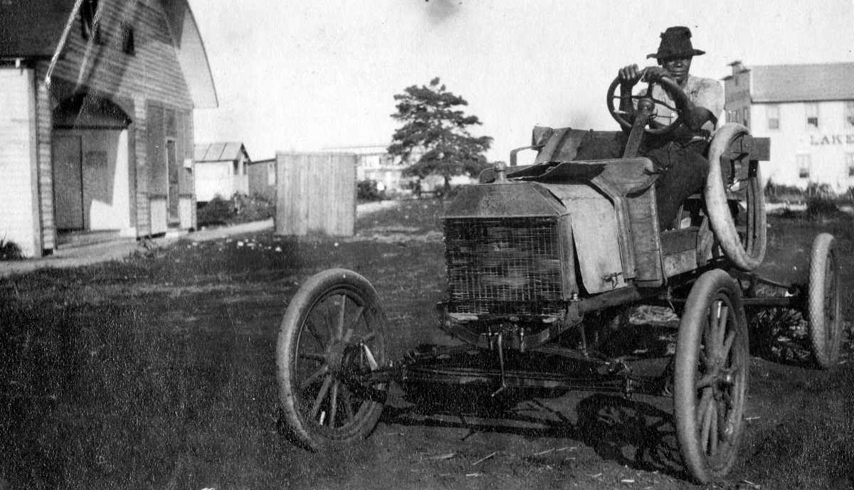 Florida Memory • African American man sitting in Ford car.