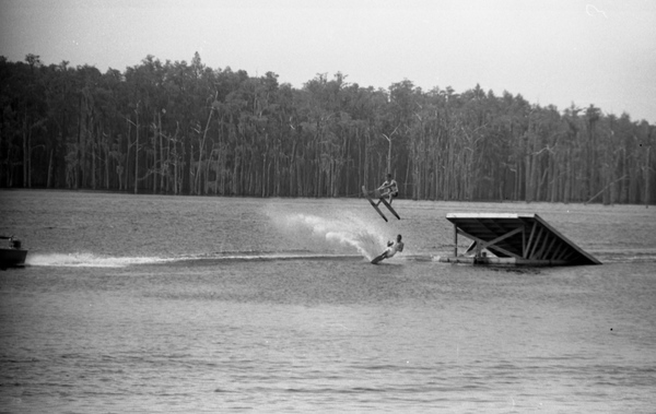 Florida Memory • Water skier jumping over another skier during show on ...