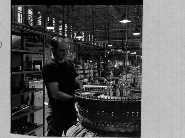 Florida Memory • Employee assembling a jet engine at Aerodex, Inc. in ...