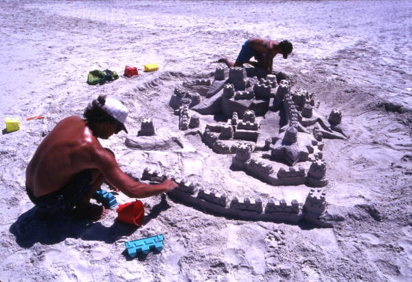 Florida Memory • Men building sand castles at St. Augustine Beach.