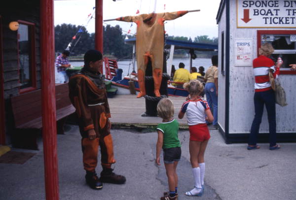 Florida Memory • Diver standing near tourists buying tickets for sponge ...