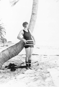 Florida Memory • Woman posing in an older style bathing suit on Miami Beach