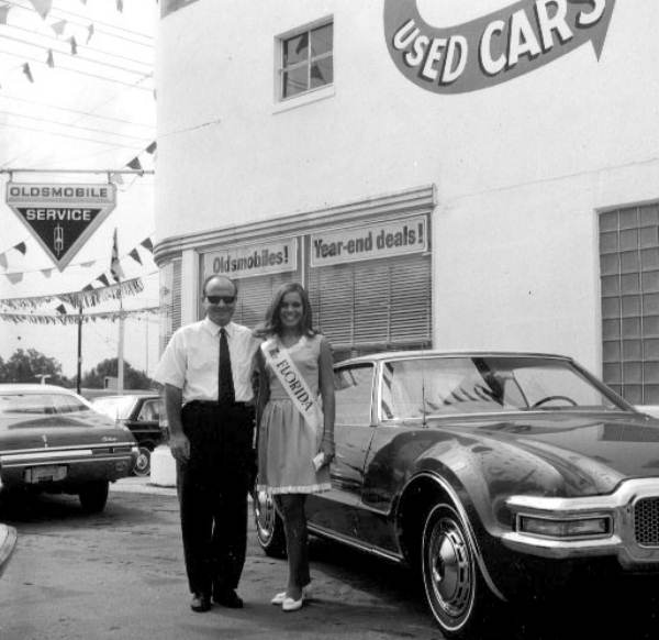 Florida Memory • Miss Florida 1968, Linda Fitts, standing next to a car ...