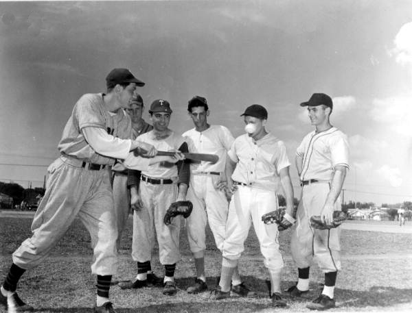 Florida Memory • Frank Verdi demonstrates a drag bunt to the students ...