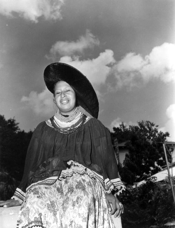 Florida Memory • Seminole Indian mother takes a break after styling her ...