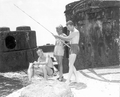 Florida Memory • Nancy Beach watches Bob Honaker unhook a red snpper ...