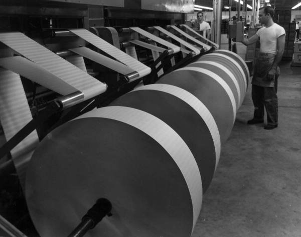 Florida Memory • View of paper rolls being fed through printing presses ...