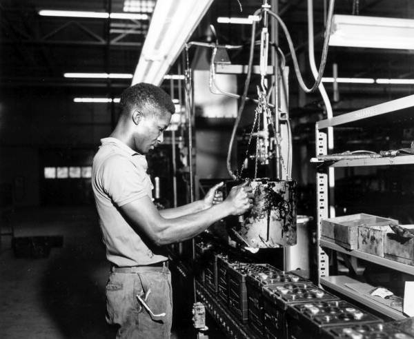 Florida Memory • Gould-National Battery employee works on the battery ...