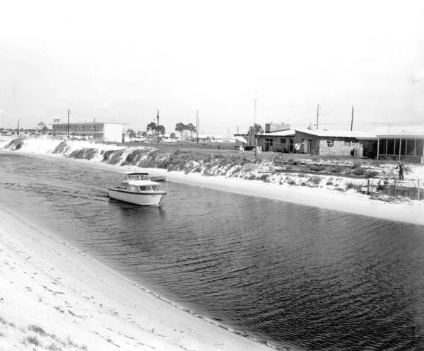 Florida Memory • Boat travels through inlet at Mexico Beach