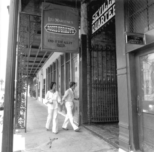 Florida Memory • Couple entering the Seville Quarter entertainment and ...