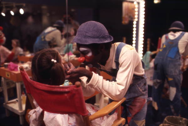 Florida Memory • Clown painting child's face at the Circus World theme ...