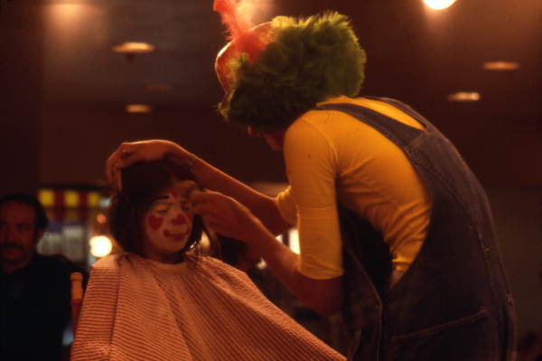 Florida Memory • Clown painting child's face at the Circus World theme ...