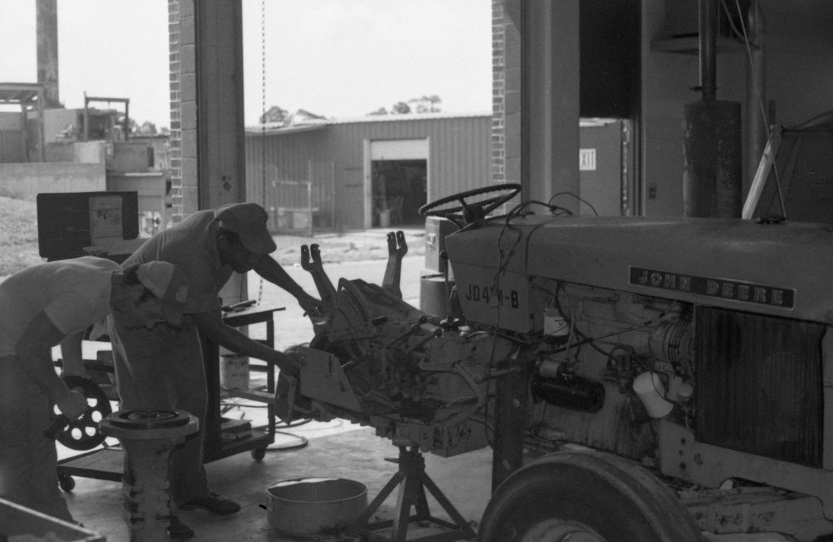 Florida Memory • Inmates learning to repair a tractor at the Brevard ...