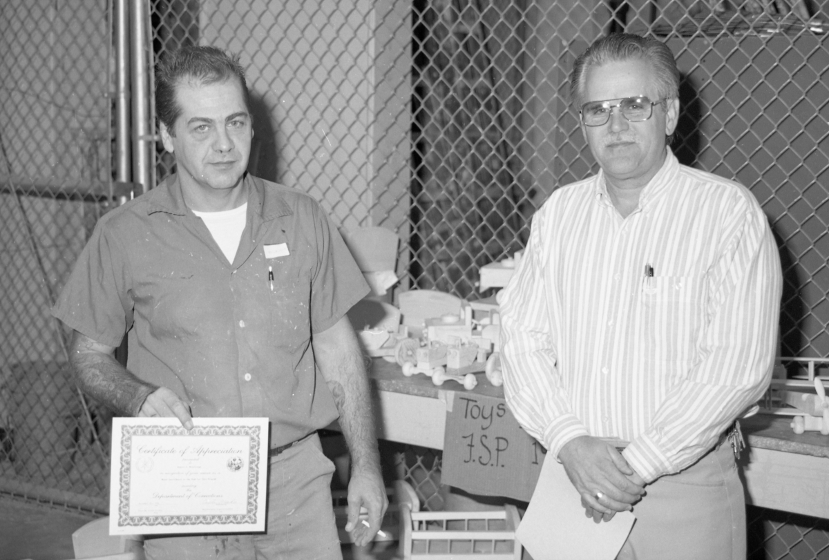 Florida Memory • Inmate with Certificate of Appreciation for the wooden ...