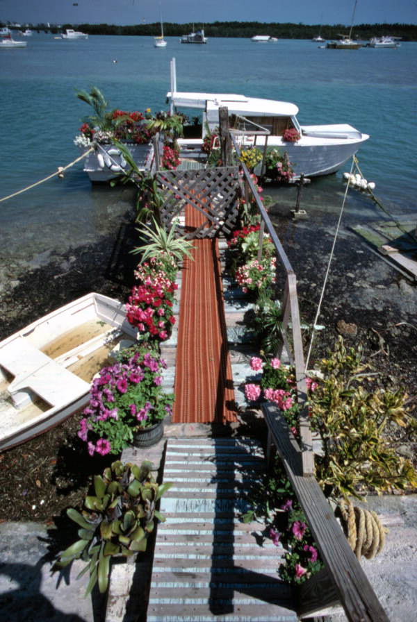 Florida Memory • Boat at the end of a small dock by "Houseboat Row" off ...