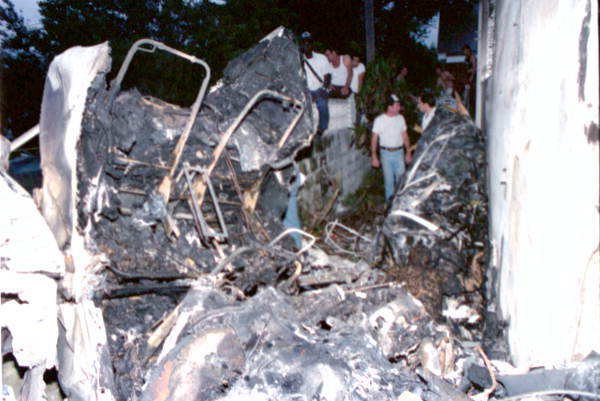 Florida Memory • Wreckage of small plane that crashed into the side of ...