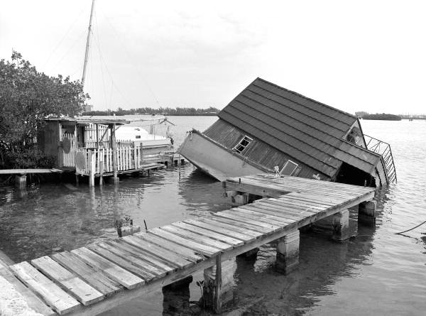 Florida Memory • Partially submerged houseboat on houseboat row, S ...