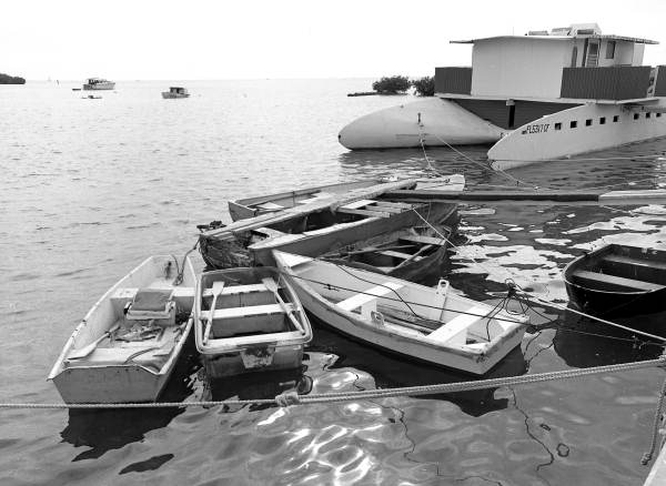Florida Memory • Skiffs moored along the seawall of houseboat boat row ...