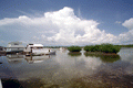 Florida Memory • Clouds rolling in over Houseboat Row - Key West, Florida.