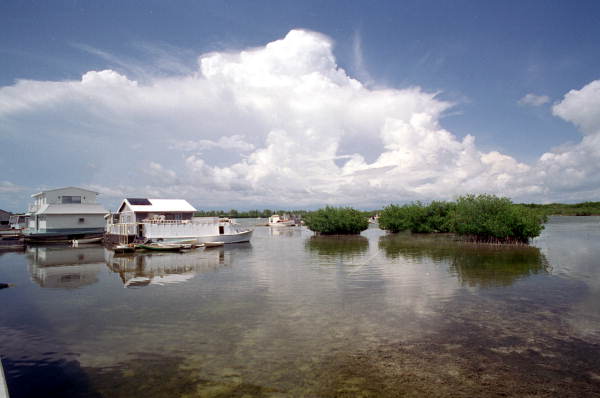 Florida Memory • Clouds rolling in over Houseboat Row - Key West, Florida.