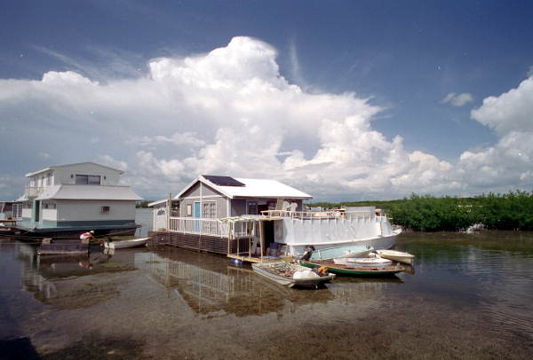 Florida Memory • Clouds rolling in over Houseboat Row - Key West, Florida.