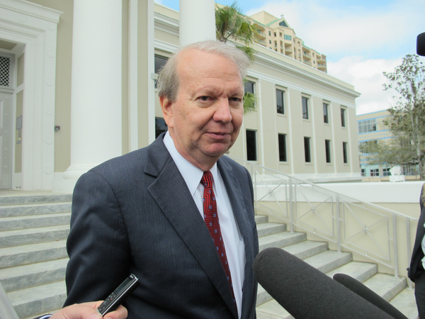 Florida Memory • Jon L. Mills speaking to reporters on the steps of the ...