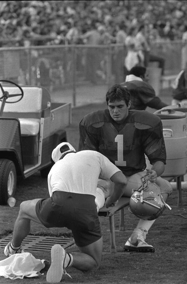 Florida Memory • Eric Thomas has his leg bandaged by a medic ...