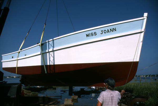 Florida Memory • Hull of the shrimp boat "Miss Joann" being carried to ...