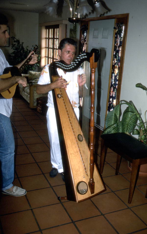 Florida Memory • Jesus Rodriguez playing Venezuelan harp while an ...
