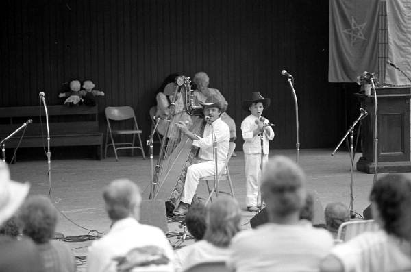 Florida Memory • Jesus Rodriguez playing Venezuelan harp at the 1986 ...