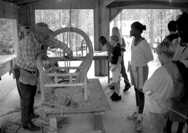 Florida Memory • Robert James Rudd building cypress furniture during ...