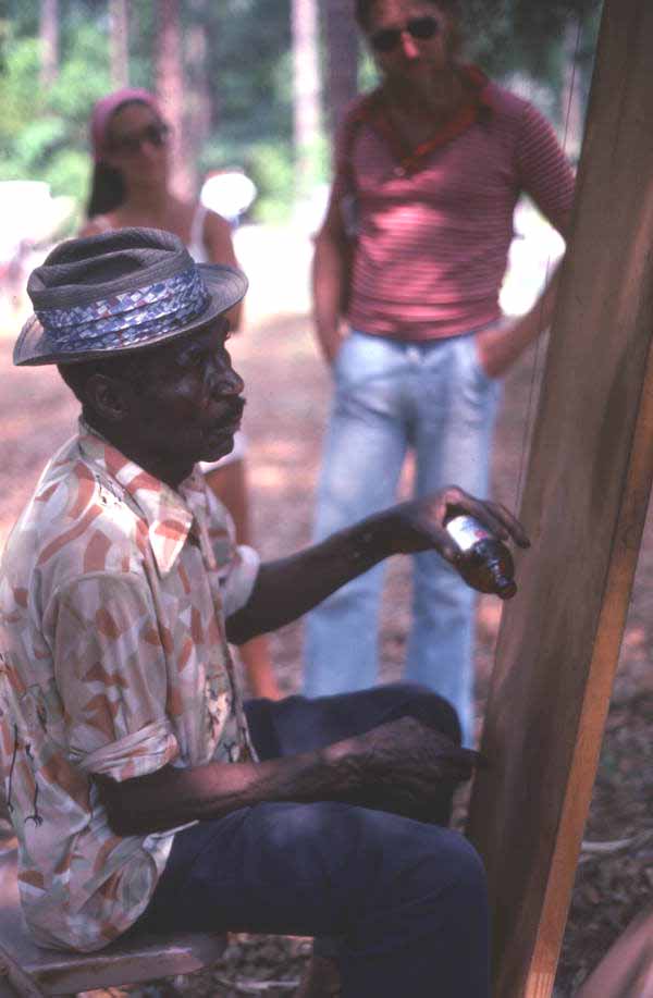 Florida Memory • Moses Williams playing the diddley bow at the 1978 ...