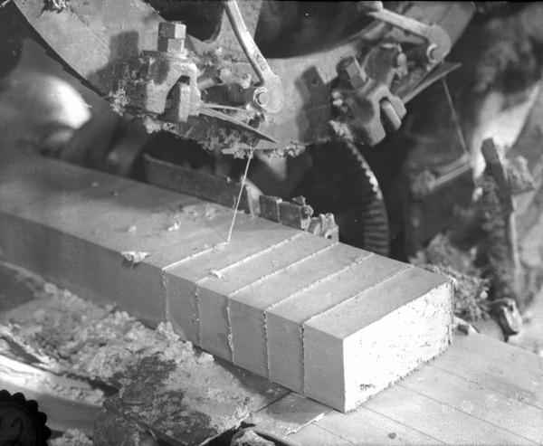 Florida Memory • Slab of clay is cut into bricks