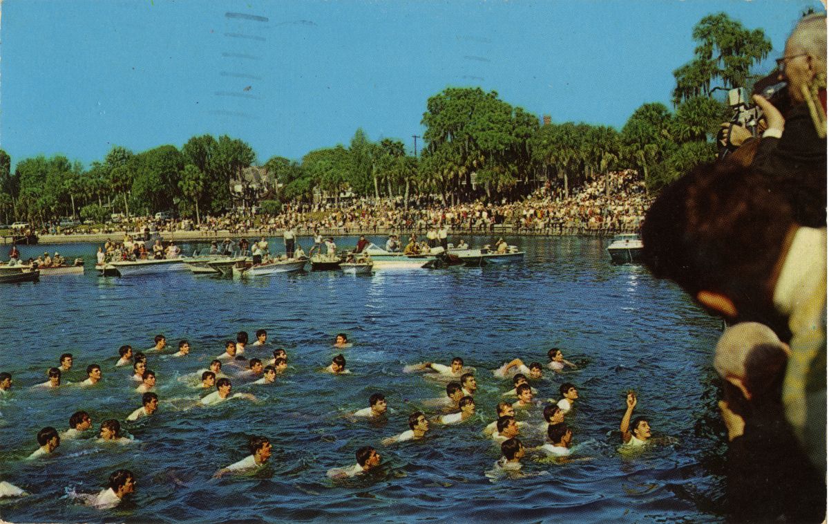 Florida Memory • Epiphany cross divers in Spring Bayou at Tarpon Springs.