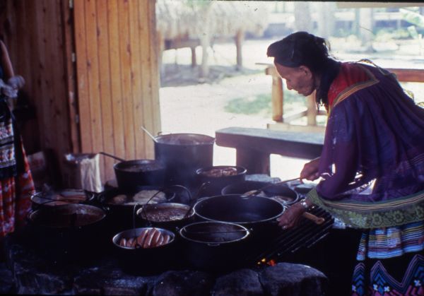 Florida Memory • Seminole woman cooking.