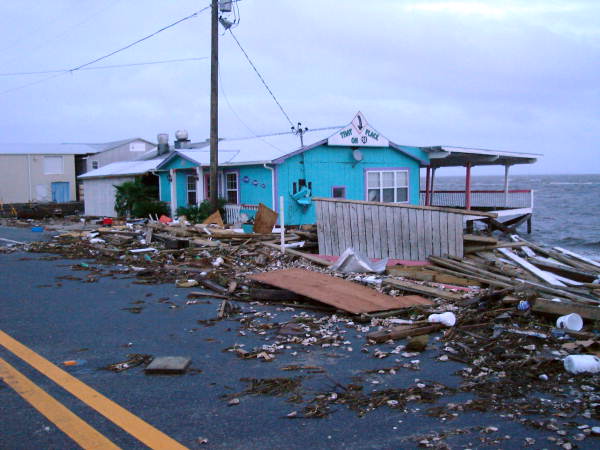 Florida Memory • Hurricane Dennis debris with damaged structure in ...