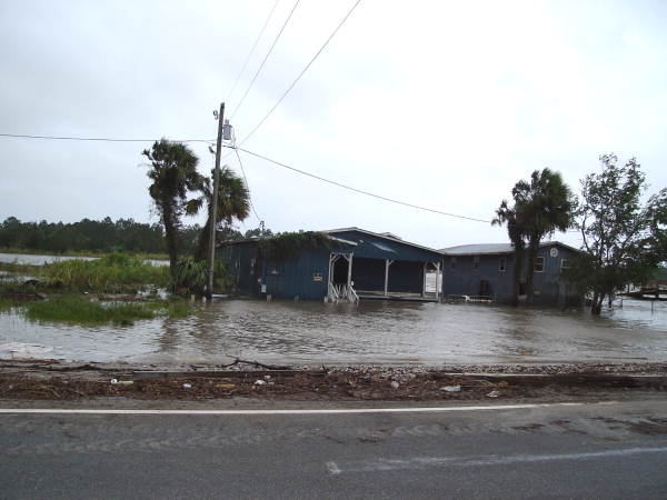 Florida Memory • Building on U.S. 98 flooded in Apalachicola from ...