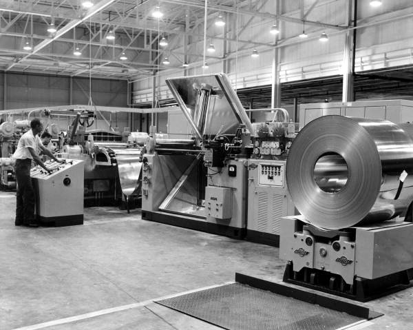 Florida Memory • Tom Chewning operating a machine at the American Can ...