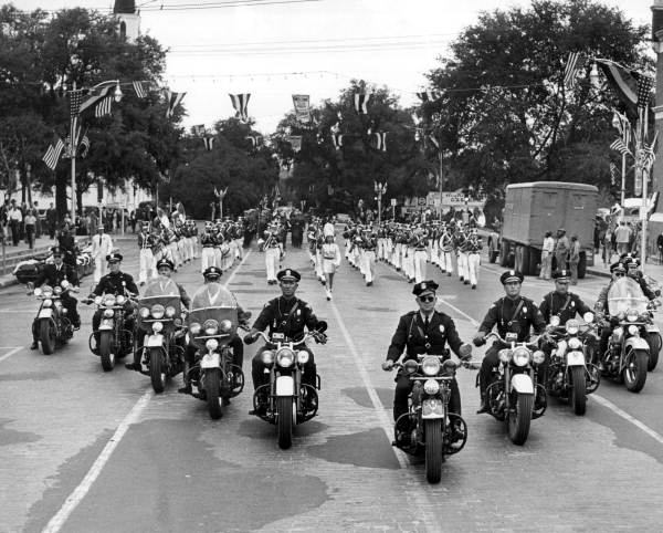 Florida Memory • Motorcycle policemen preceding marching band in parade ...