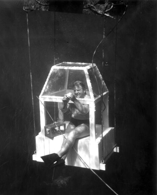 Florida Memory • Newt Perry fishing from an underwater air trap ...