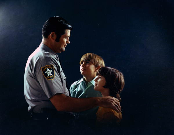 Florida Memory • Suwannee County sheriff speaking to two boys for the ...