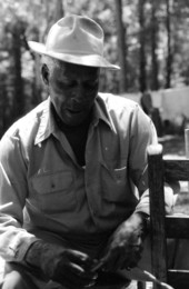 Florida Memory • Rufus Adams making corn shuck chair bottoms