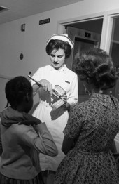 Florida Memory • Doris Mathis demonstrating oral hygiene to children in ...