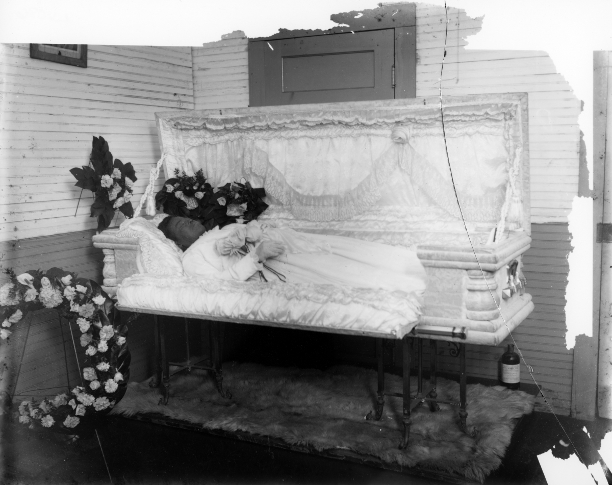 Florida Memory • Woman laid in a coffin in her home